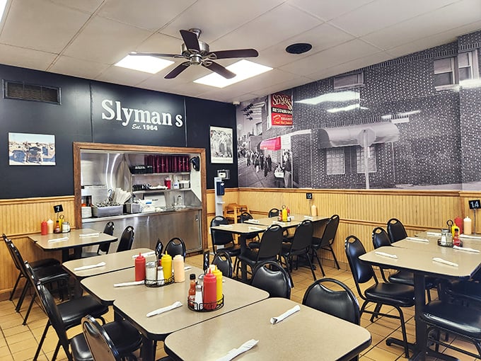 Simple tables, ceiling fans, and Cleveland memorabilia create the perfect no-nonsense backdrop for the serious sandwich business happening here daily.