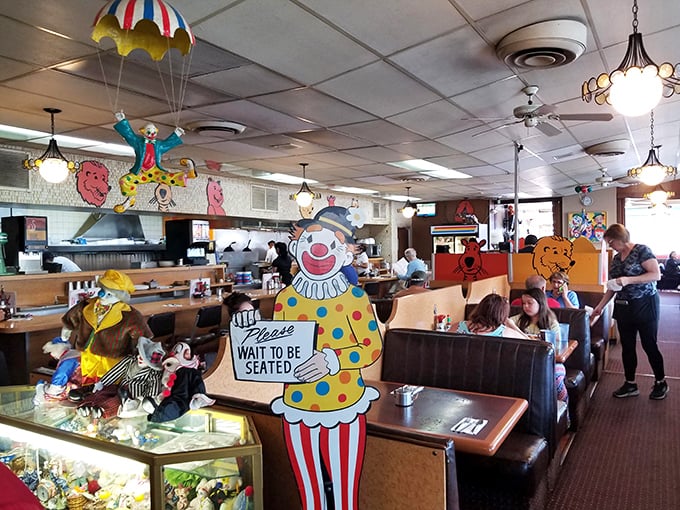Step inside and the circus truly begins—colorful clowns, vintage booths, and the promise of pancake perfection await hungry patrons.
