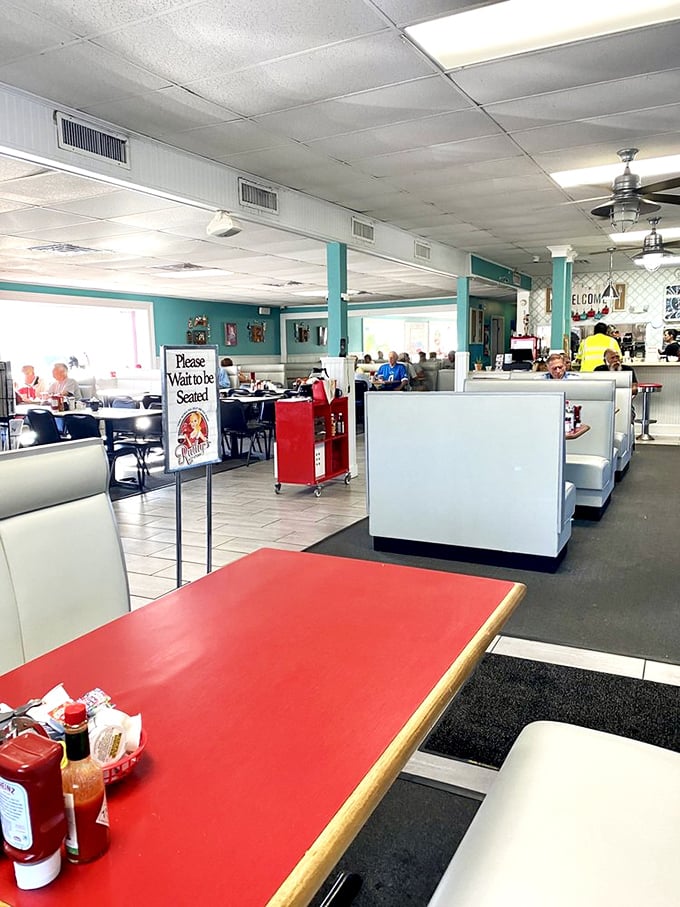 Classic diner aesthetics meet Florida charm inside Ruthy's, where those red tables promise good things are about to happen to hungry people.
