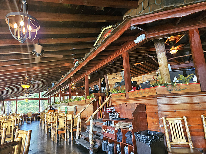 Timber beams and natural wood create a dining room that feels like a luxurious treehouse for grown-ups with impeccable taste.