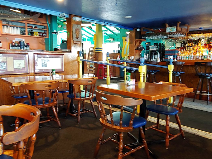 Step inside and you're transported to a mariner's dream—wooden accents, nautical charm, and a bar that beckons like a lighthouse to thirsty sailors.