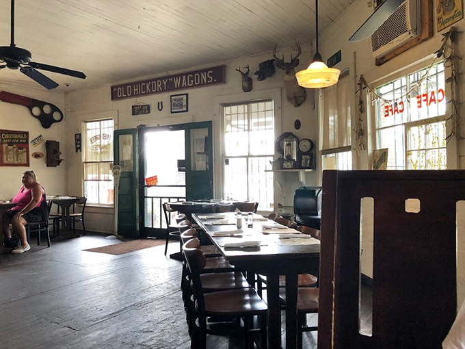 Step inside and time slows down. The worn wooden floors and vintage signs aren't manufactured nostalgia—they're the real deal, earned through decades of service.