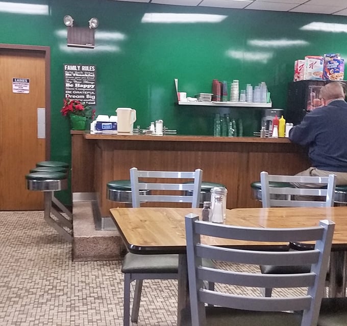 Classic diner simplicity with those signature green walls—like being in your favorite aunt's kitchen, if your aunt made legendary corned beef.