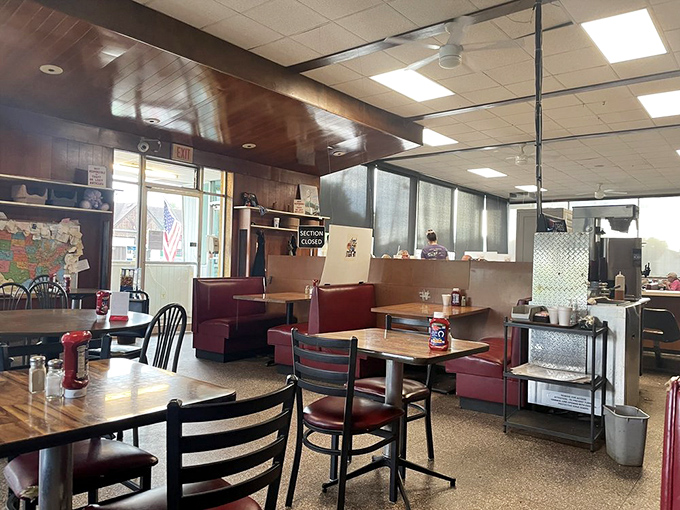 Where wood paneling meets red vinyl booths – this isn't retro by design, it's authentic by survival. Dining history preserved in amber.