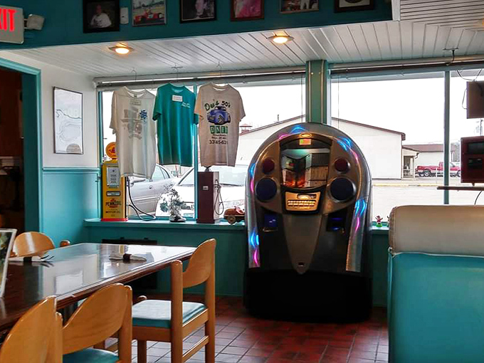 Where nostalgia meets nourishment! The classic jukebox stands ready to provide the soundtrack to your meal, while branded t-shirts remind you to take the experience home.