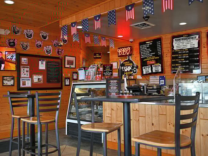 American flags hang proudly above wooden walls that have absorbed years of delicious smoky aromas – the best kind of interior decorating there is.