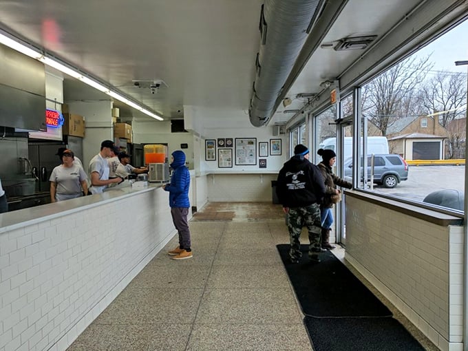 Where fluorescent lights and white tiles create the perfect backdrop for hot dog excellence.