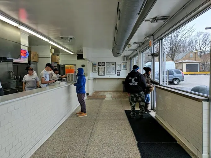 Where fluorescent lights and white tiles create the perfect backdrop for hot dog excellence.