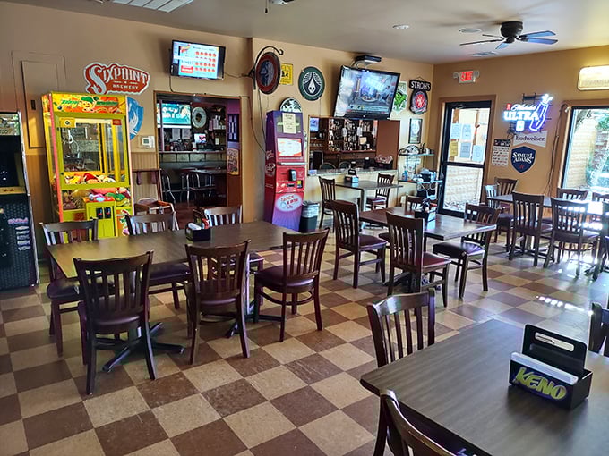 Inside, the checkerboard floor and no-nonsense wooden tables tell you everything you need to know—this place prioritizes substance over style, just as it should.