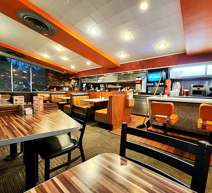 Step inside and time stands still. The orange and brown color scheme somehow works, creating an atmosphere that's both energizing and comforting.