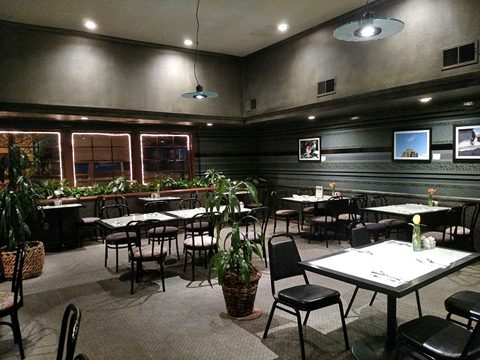 Inside, the sophisticated dark wood paneling and strategically placed greenery create an atmosphere that's both elegant and comforting—breakfast with a side of ambiance.