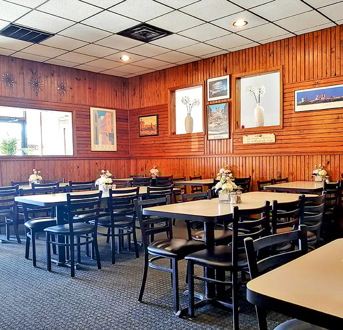 Wood paneling that's seen decades of happy diners, simple tables adorned with fresh flowers—this isn't Instagram bait, it's the real deal.