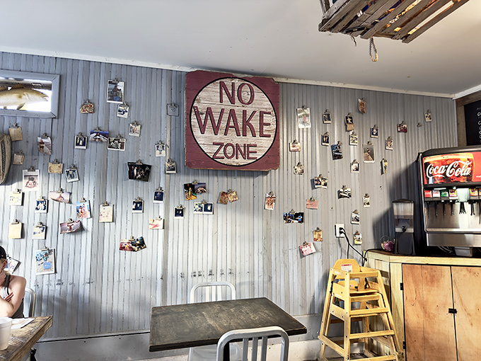 The "NO WAKE ZONE" sign isn't just clever decor—it's a philosophy. Slow down, savor each bite, and let the fishing photos tell their salty tales.