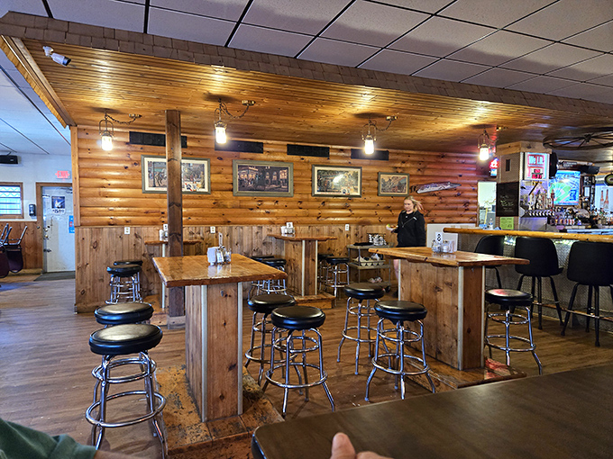 Step inside where wood-paneled warmth meets genuine hospitality in every cozy corner and conversation.