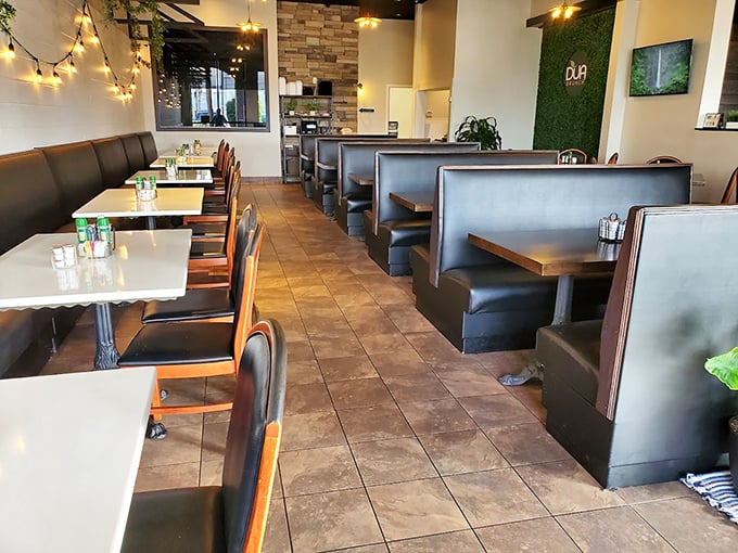 Modern comfort meets breakfast bliss in this thoughtfully designed interior. The booths practically whisper, "Stay awhile, have another coffee."