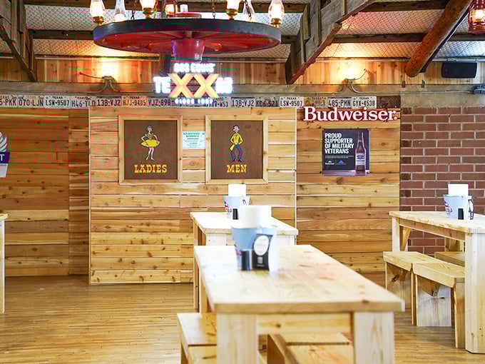 Inside, rustic charm meets serious barbecue business where wooden tables have witnessed countless satisfied sighs.