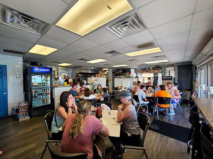 Inside, no-frills tables fill with happy diners. This isn't where you come for the decor—it's where you come for seafood that makes you forget your name. 