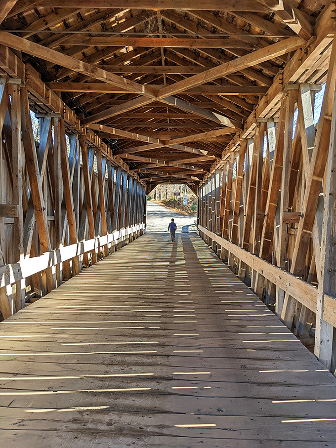 Step inside and you're transported to another era. The intricate wooden lattice work overhead tells stories of craftsmanship that modern buildings can only dream about.