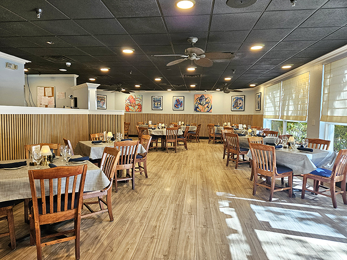 Where wooden warmth meets coastal cool—the dining room balances casual comfort with just enough elegance to make your seafood feel special.
