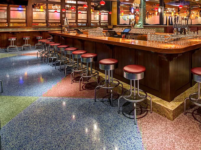 The bar's terrazzo-style floor and warm wooden countertops create that perfect "I should have worn my fancy flip-flops" coastal vibe.