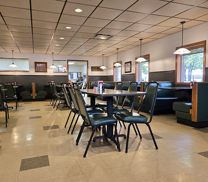Classic diner aesthetics with a touch of homey charm. Those green booths have cradled countless conversations and comfort food comas through the decades.