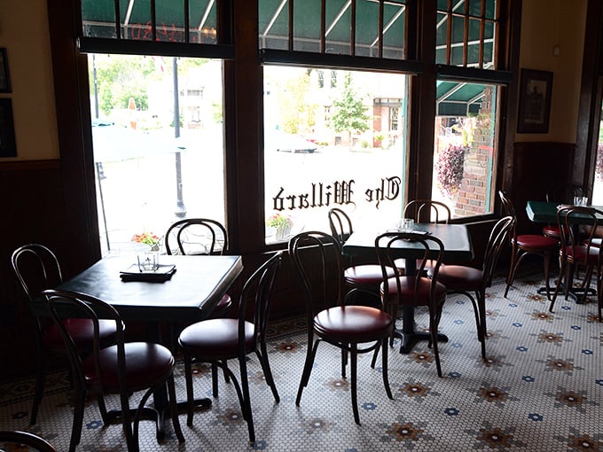 Classic bentwood chairs and vintage tile floors set the scene for culinary nostalgia. This isn't Instagram-bait decor—it's the real deal, where conversations matter more than selfies.