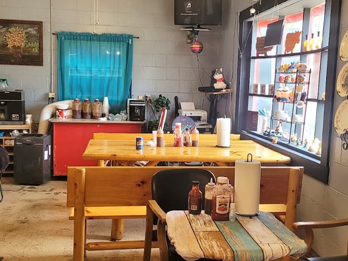 Simple wooden tables and homey decor create the perfect backdrop for serious barbecue consumption. No distractions from the main event here!