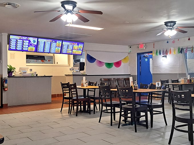 Simple, clean, and welcoming—Sami's dining room lets the food take center stage while colorful paper decorations add just enough festive charm.