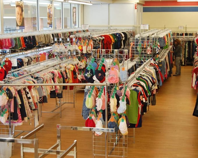 Racks upon colorful racks stretch toward the horizon. This isn't just shopping—it's an expedition through a kaleidoscope of previously-loved possibilities.