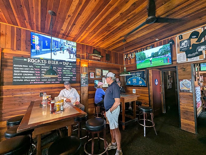 Warm cedar paneling and cold beer create the perfect backdrop for burger bliss. This isn't designer "rustic"—it's the real deal, earned through decades of loyal patronage.