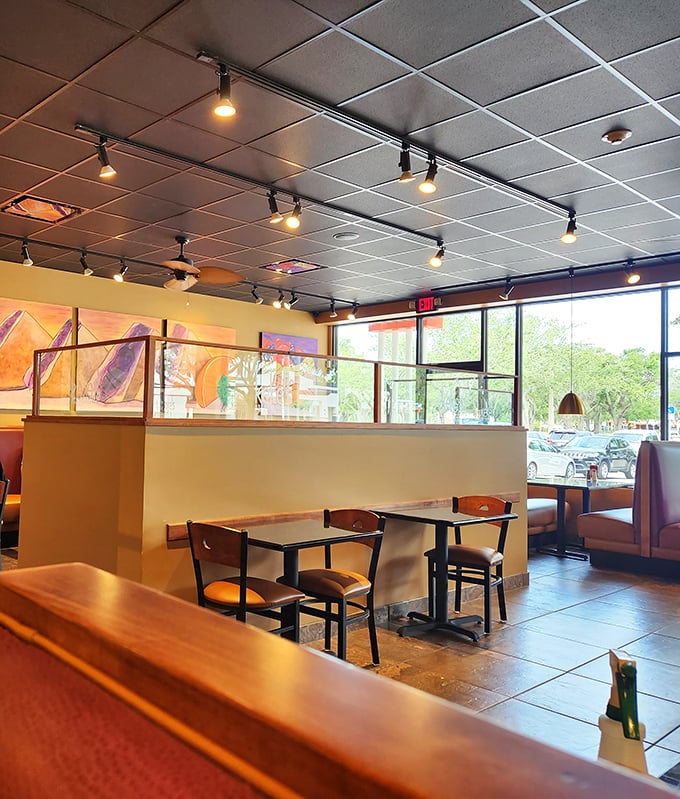 Booths that invite lingering conversations and second coffee refills. The morning light streams through windows, turning ordinary breakfast into a sun-kissed affair.
