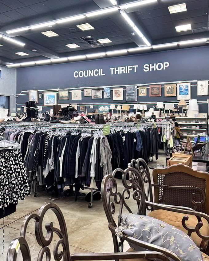 Inside, racks of carefully organized clothing stretch beneath artwork-adorned walls, promising treasures for those willing to hunt.