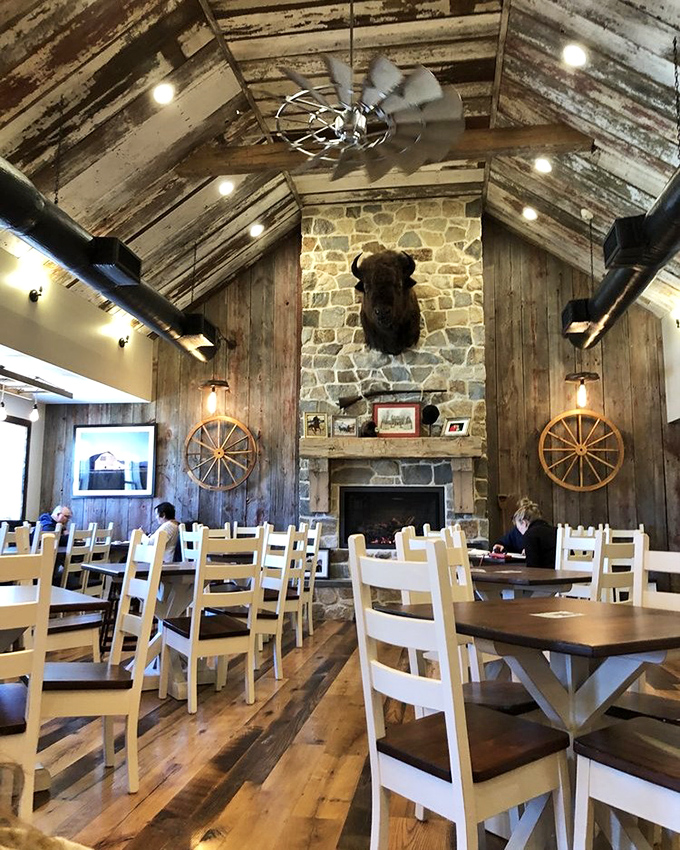 Step inside and you're greeted by rustic elegance—soaring ceilings, weathered wood, and a buffalo that's seen more good meals than most food critics. Country charm meets culinary sanctuary.