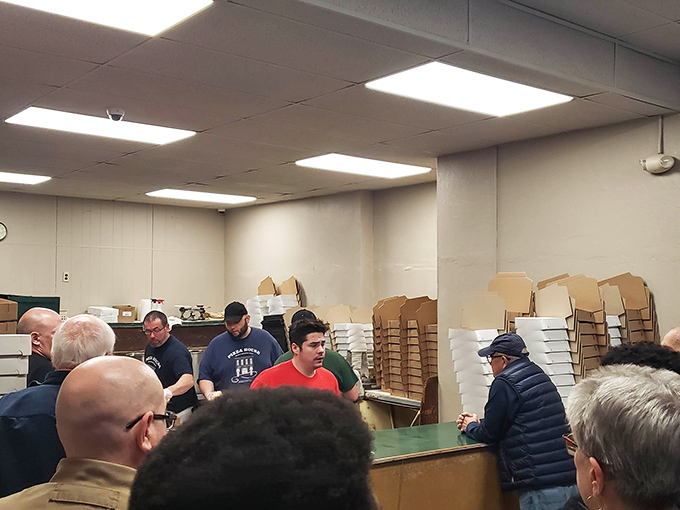 No fancy dining room needed when the pizza's this good. The spartan interior keeps the focus where it belongs – on that legendary rectangular pie.