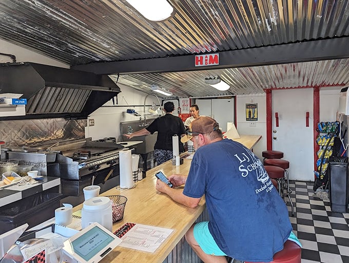Simple, nostalgic, and utterly perfect—the interior whispers tales of decades serving delighted customers, with that unmistakable diner authenticity money can't buy.