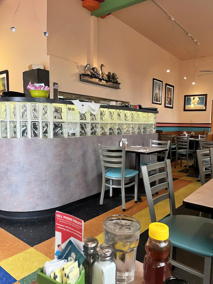 Inside, glass blocks and colorful floor tiles create a retro-cool vibe that feels like stepping into your favorite aunt's kitchen—if your aunt were impossibly hip.