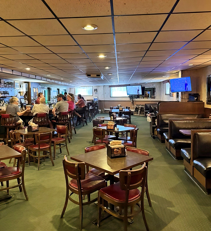 Inside, the classic diner aesthetic with red vinyl chairs and wood-paneled walls creates the perfect backdrop for Green Bay's favorite comfort food conversations.