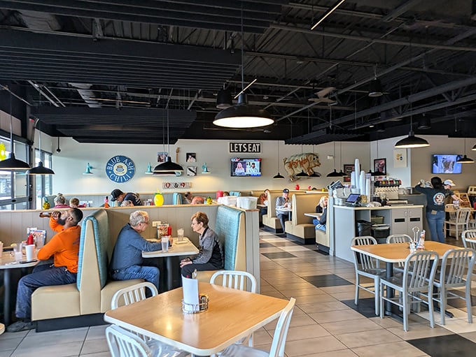 Inside, teal booths and a "LET'S EAT" sign tell you everything you need to know about this no-nonsense temple to Cincinnati's unique chili culture.