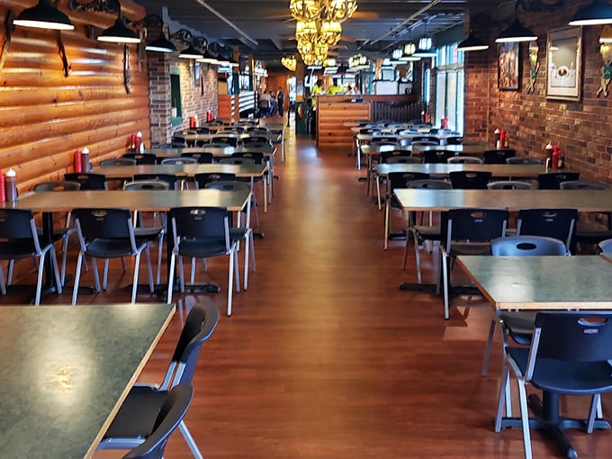 Inside, the warm wood paneling and no-nonsense tables create that perfect "focus-on-the-food" atmosphere. This isn't Instagram decor—it's barbecue business.
