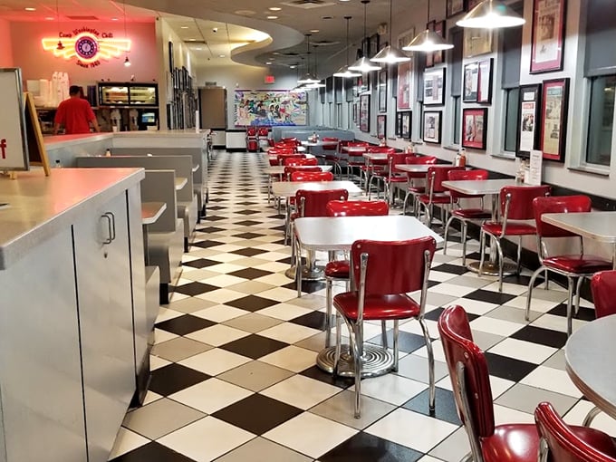 Classic Americana comes alive with checkerboard floors and cherry-red vinyl booths—a diner wonderland where time stands deliciously still.