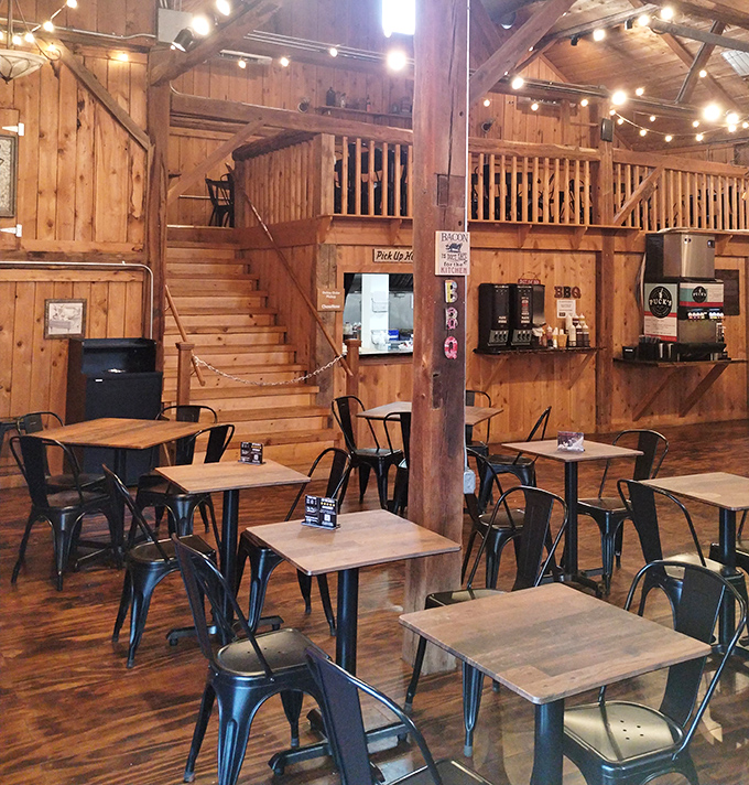 Rustic wooden charm meets modern industrial touches inside, where every beam and board seems to whisper, "Settle in, the meat's worth the wait."