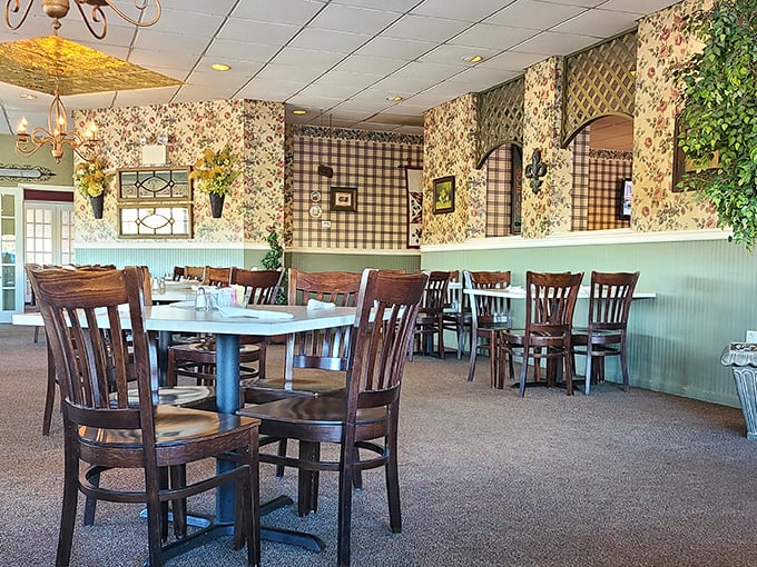 Step inside to a world where floral wallpaper and checkered accents create the perfect backdrop for comfort food indulgence.