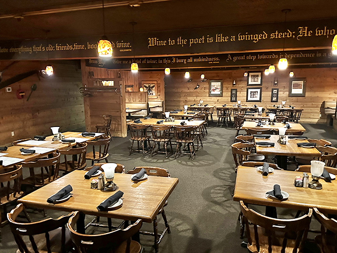 Literary quotes adorn the walls while wooden tables stand ready for serious steak business. This isn't Instagram-bait decor; it's the real deal.