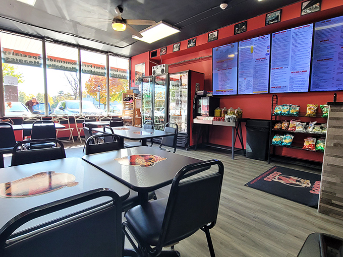 Simple tables, bright red walls, and a menu that demands attention. In the sandwich world, this is what we call "cutting to the chase."