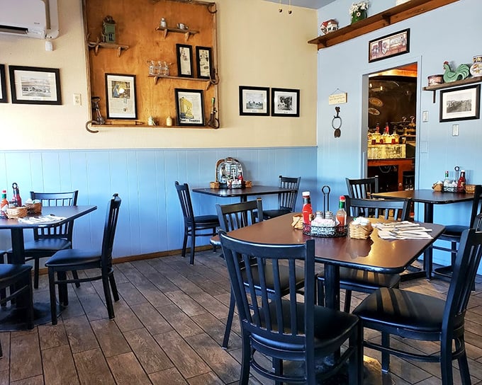 Step inside to find that perfect small-town diner atmosphere—wooden floors, blue wainscoting, and tables arranged for both privacy and community. Pure Arizona comfort.