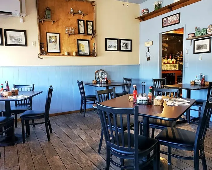 Step inside to find that perfect small-town diner atmosphere—wooden floors, blue wainscoting, and tables arranged for both privacy and community. Pure Arizona comfort.