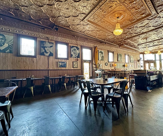 That pressed tin ceiling isn't just showing off—it's witnessed decades of great meals and conversations. Edison would approve of both the lighting and the ambiance.