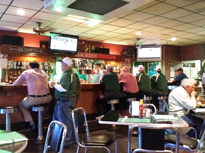 Where everybody knows your name—the bar area buzzes with regulars who've made this their second living room. Cold drinks and hot conversation flow as freely as the gravy.