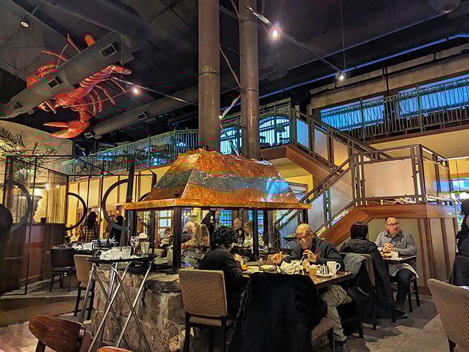 The giant lobster suspended from the ceiling isn't just decoration—it's a preview of the oceanic delights awaiting below.