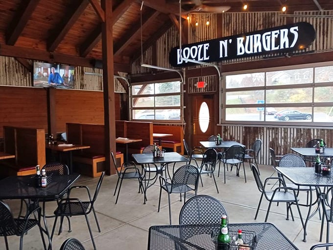 Inside, corrugated metal meets wooden beams in a space that feels both industrial and cozy—the perfect backdrop for serious eating.
